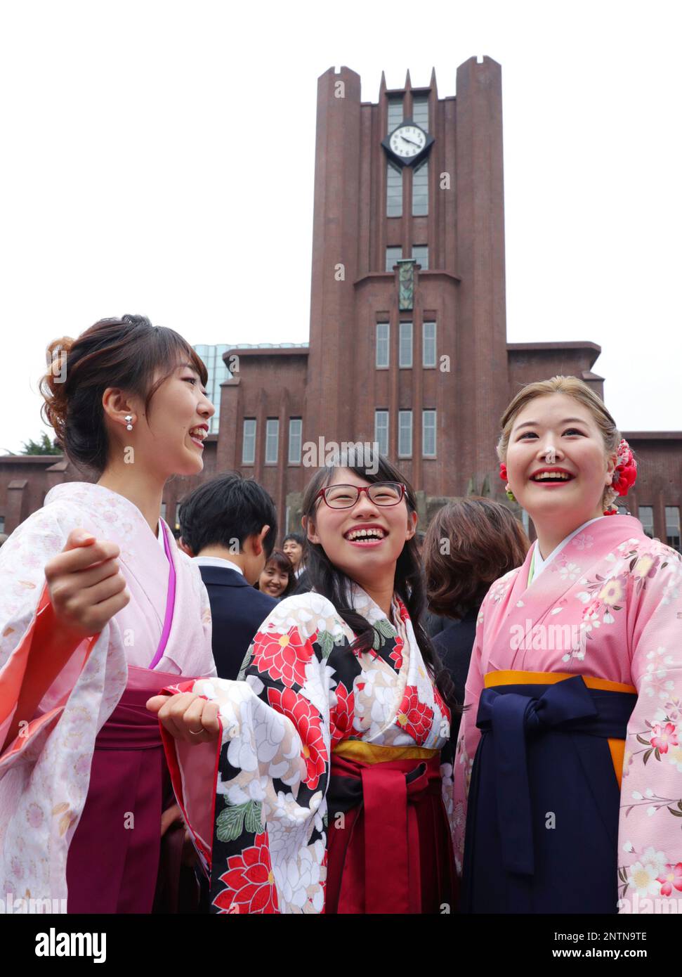 Graduate students of Tokyoi University pose for a photograph in front ...
