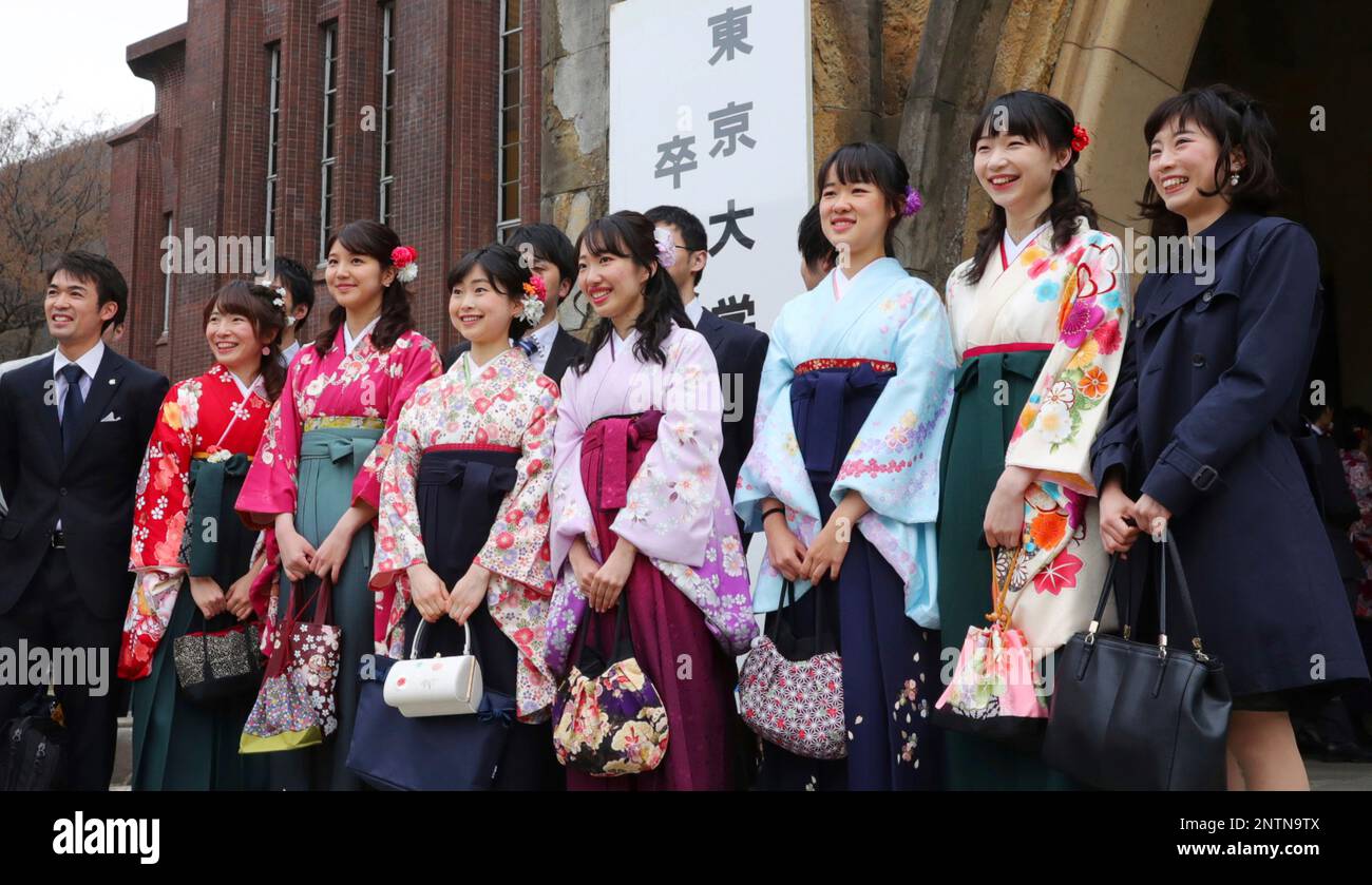 Graduate students of Tokyoi University pose for a photograph in front ...