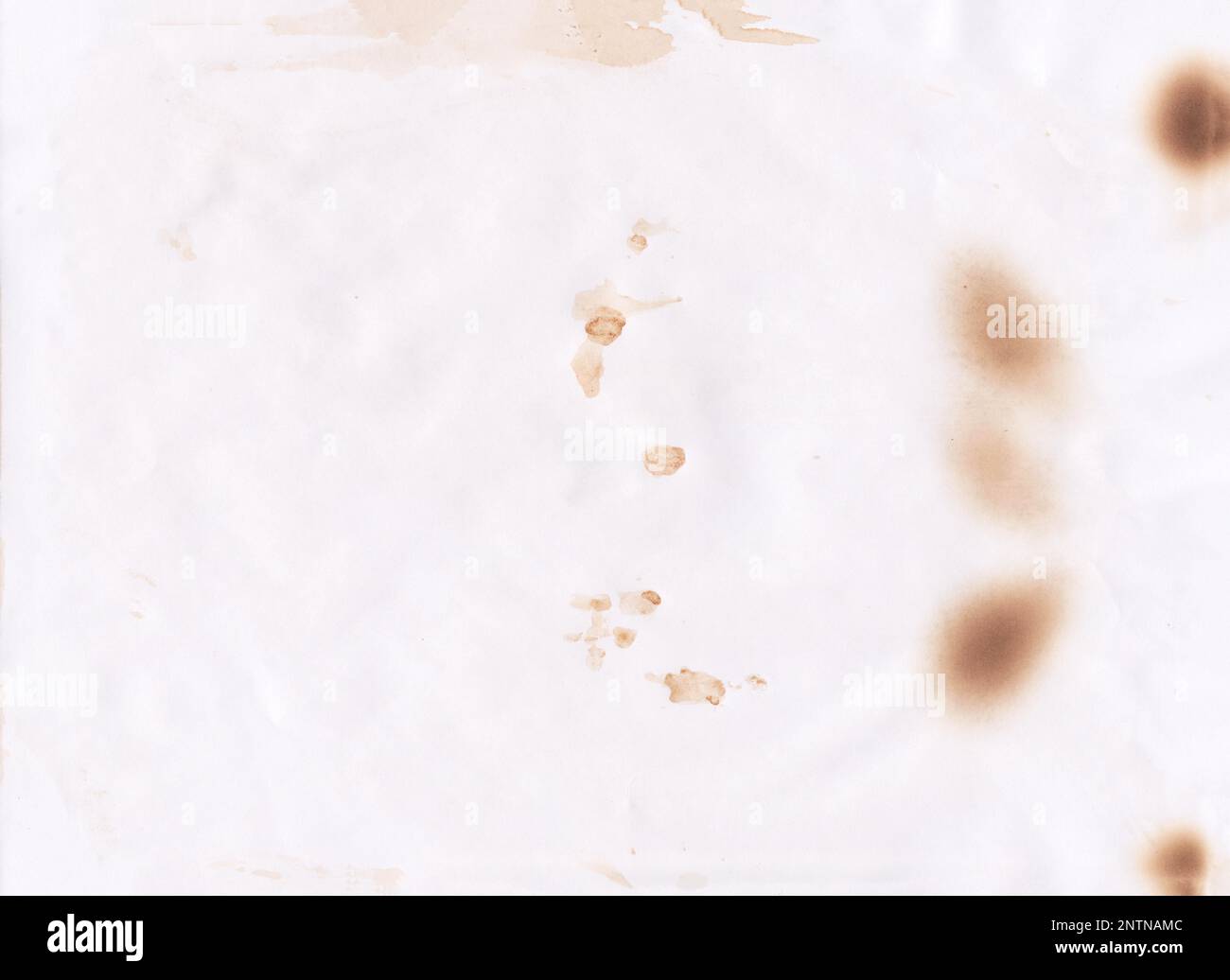 Vintage colored of old paper background with thermal burn marks for ...