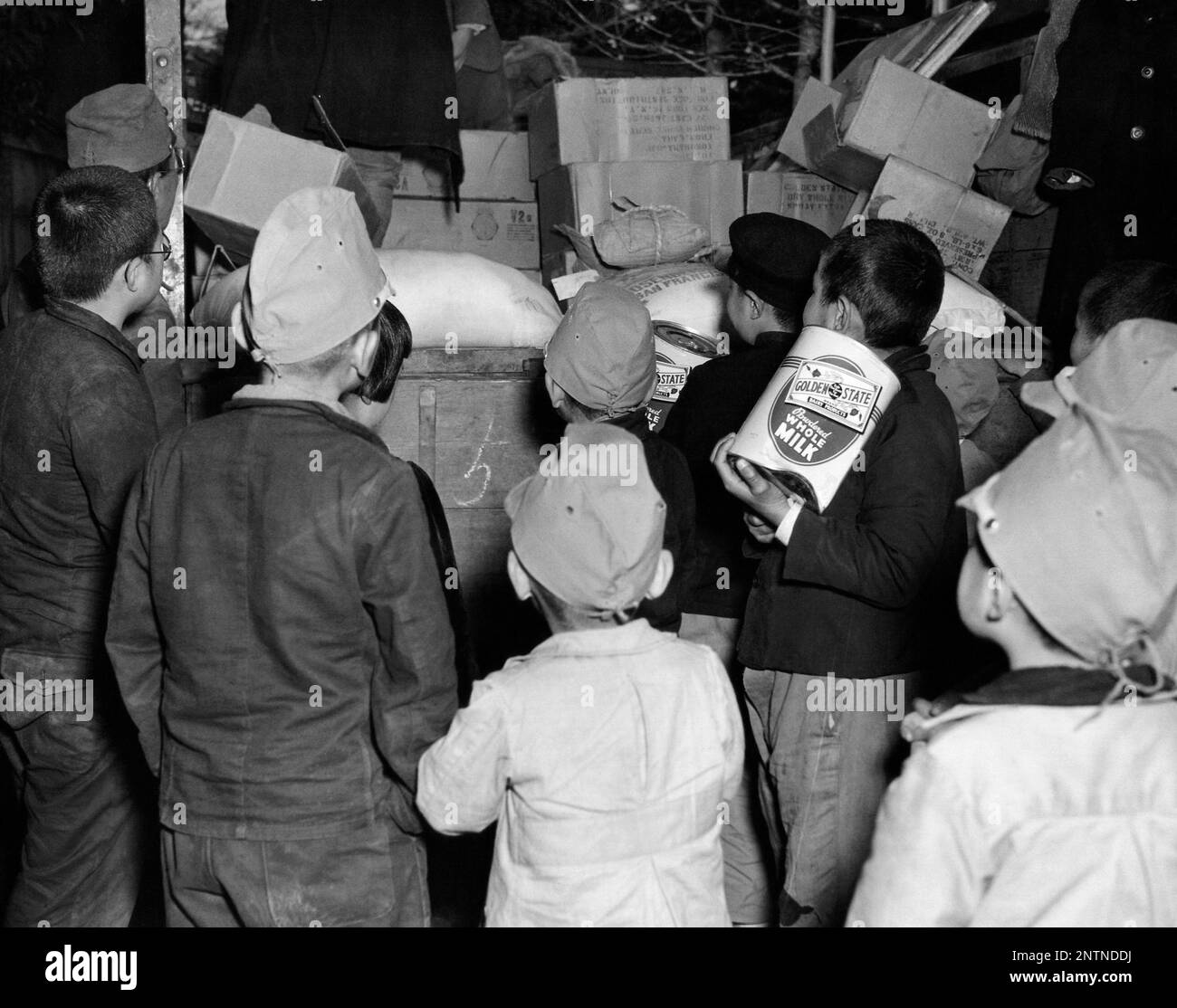 In this image provided by the U.S. Army Signal Corps, an anxious group ...