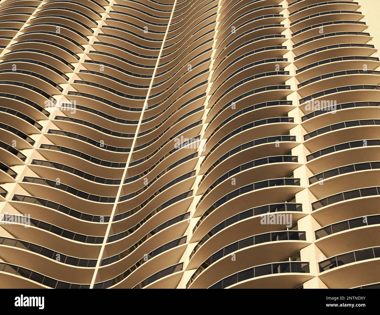 perspective view on skyscraper with balconies in modern city, city ...