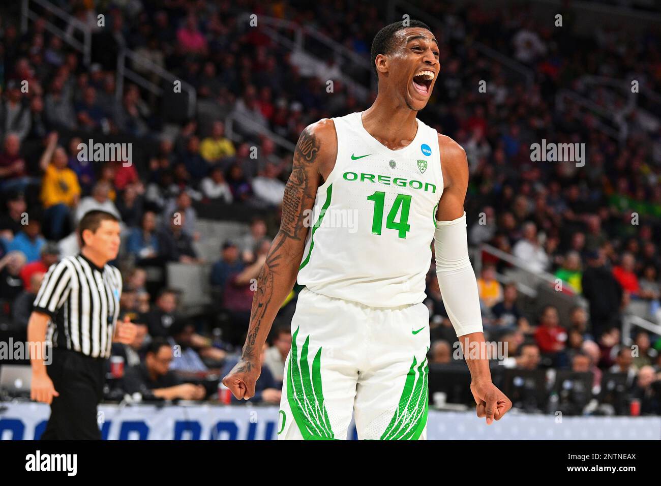 SAN JOSE, CA - MARCH 24: Oregon forward Kenny Wooten (14) celebrates ...
