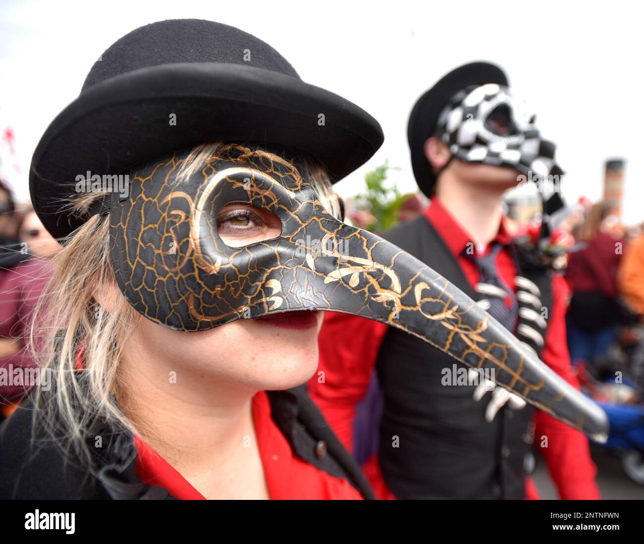 Anna Kotov, left, and her boyfriend, Mark Van Baak, both of Troy, wear ...