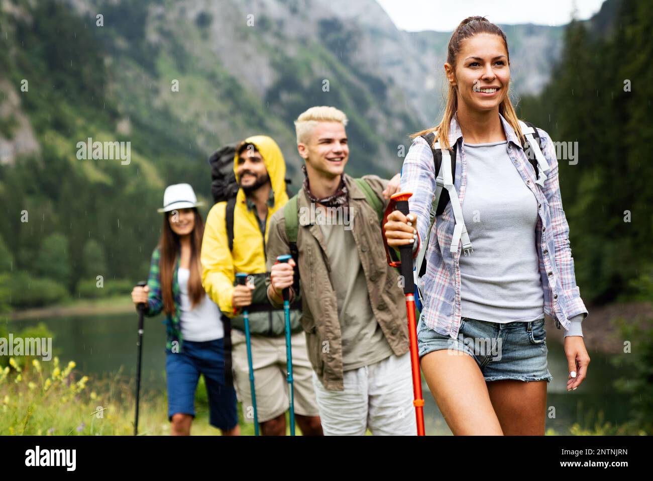 Group of happy friends enjoying outdoor activity together Stock Photo ...