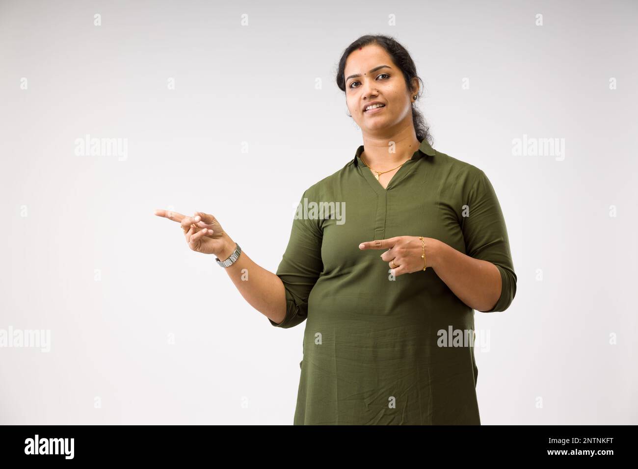 Portrait of an Indian woman,Standing pose showing different gesters ...