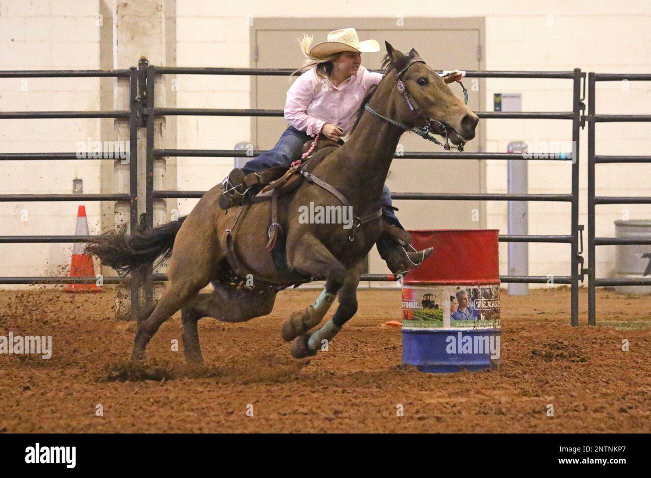 Jessica McKinney, of Goldsboro, Texas, competes in the barrel racing ...