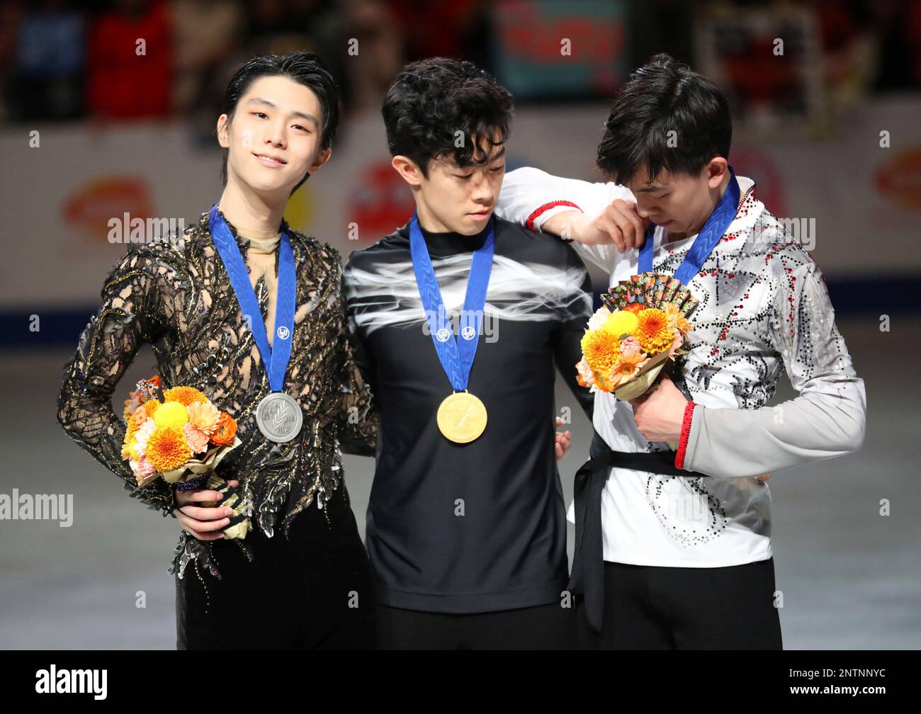 (L to R) Japan's Yuzuru HANYU, silver, U.S. Nathan CHEN, gold, and Vincent ZHOU, bronze, pose ...