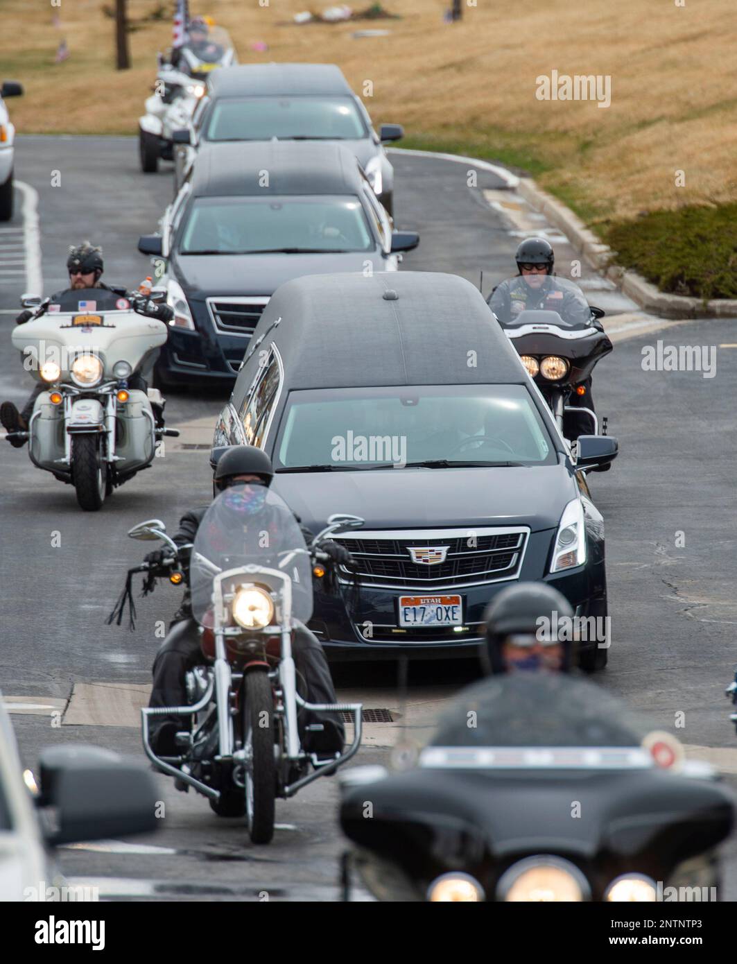 The funeral procession for 2nd Lt. Lynn W. Hadfield arrives at Veterans ...
