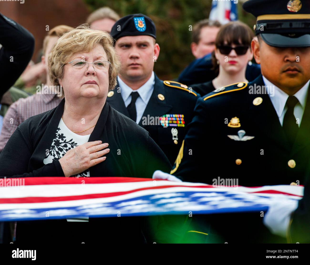 Mary Ann Turner, the daughter of 2nd Lt. Lynn W. Hadfield, watches the ...