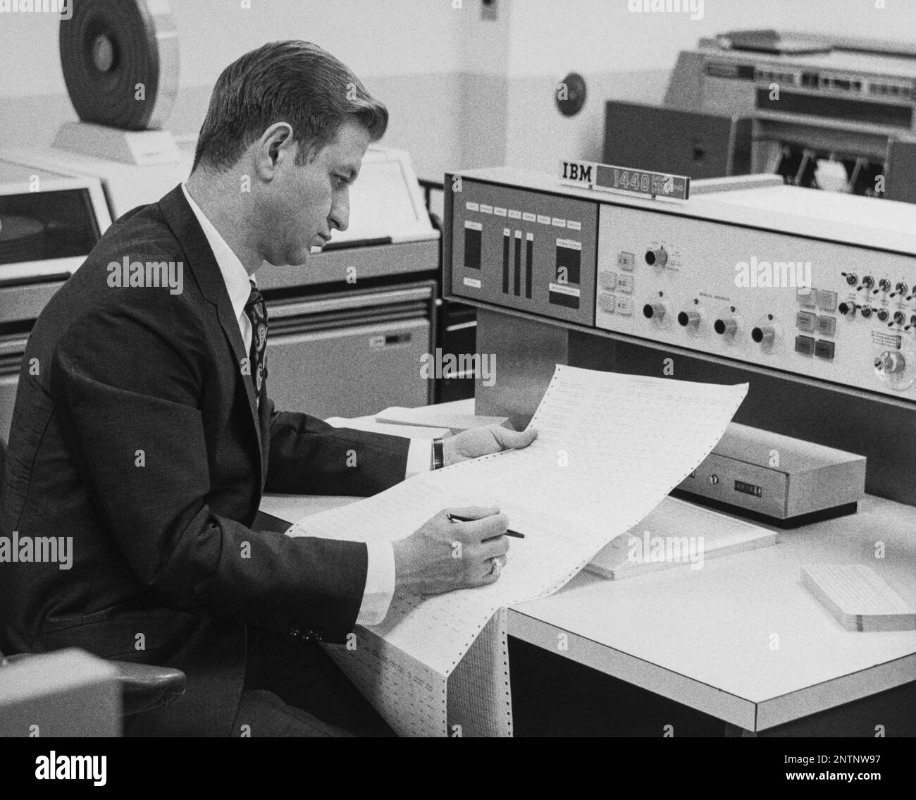 Rep. Jerry Litton, D-Mo. shown a computer examining a printout in a ...