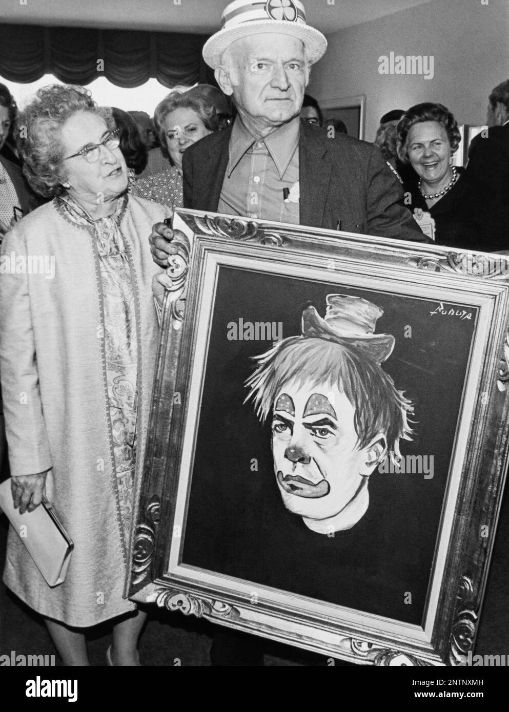 Ervin, D-N.C. and wife Margaret Bell Ervin holding a Boruta painting ...