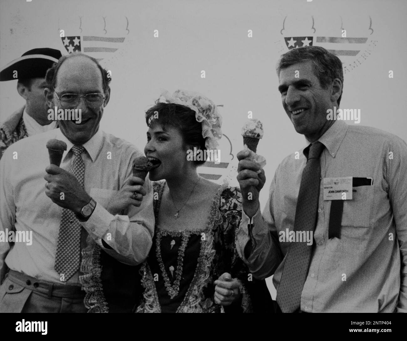 Sen. Malcolm Wallop, R-Wyo., eating ice cream with the ice-cream maiden ...