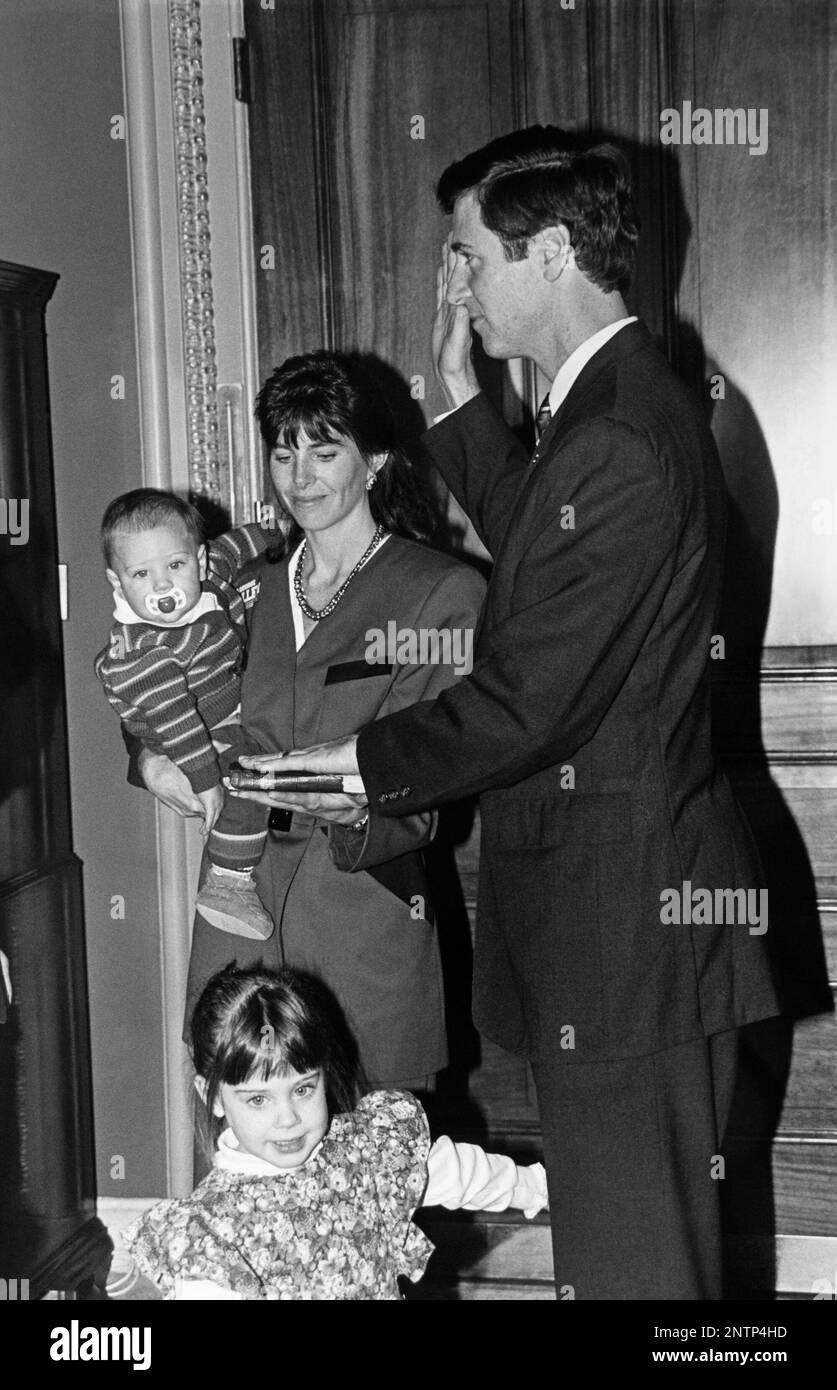 Rep. George Allen, R-Va. mock swear in Tuesday with his wife, Susan ...