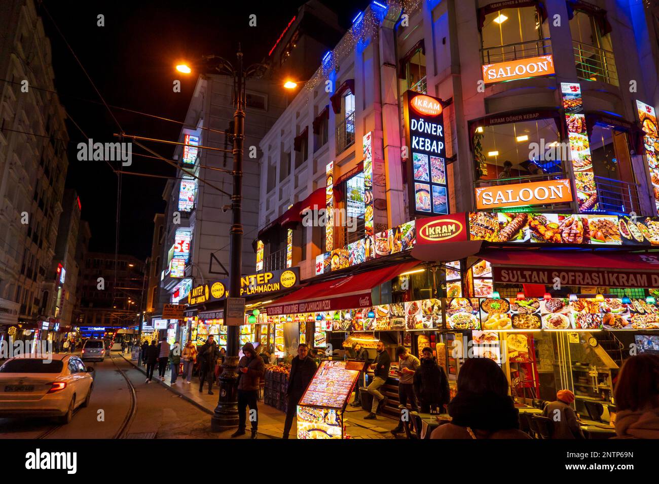 Istanbul, Turkey - February 15, 2023: People walking on sidewalk near ...