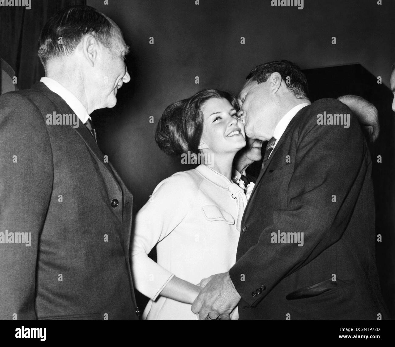 Rep. Thomas Hale Boggs, D-La., House Majority Whip, kisses Sen. James ...