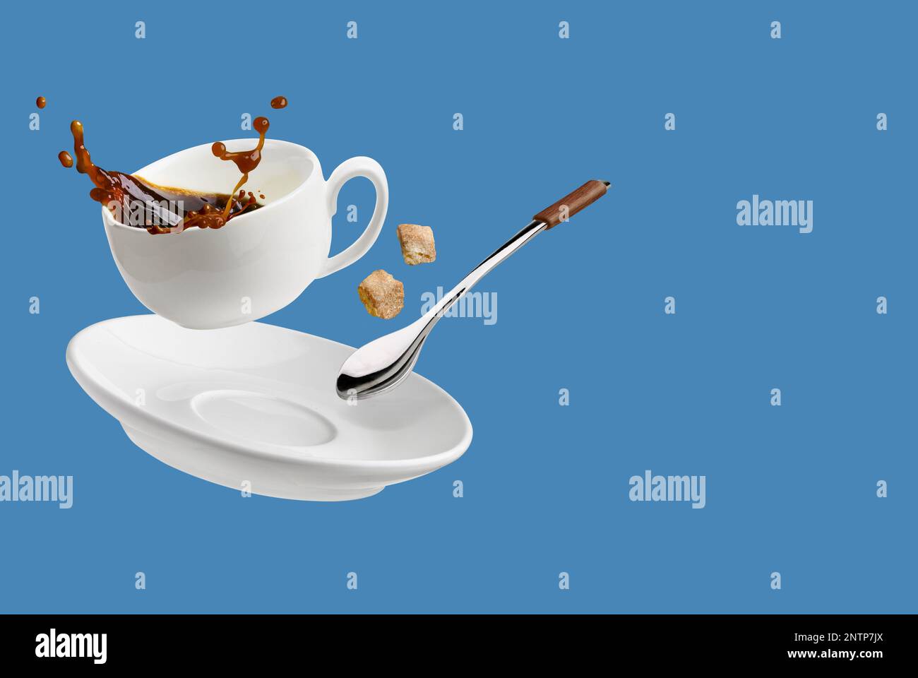 Flying Coffee cup isolated on a solid blue background Stock Photo - Alamy