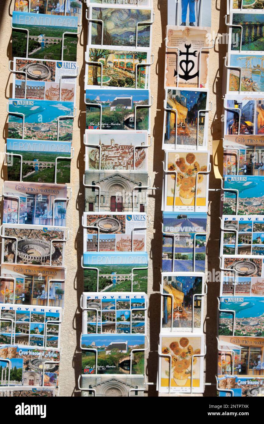 France, Arles, postcards on sale in tourist shop in this historic town ...