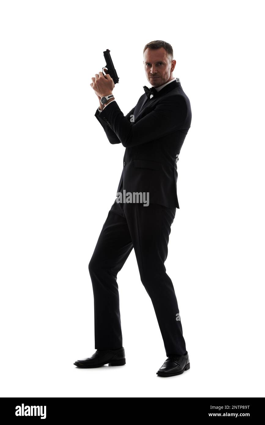 Man gun tuxedo hi-res stock photography and images - Alamy