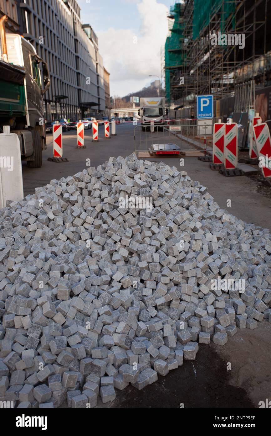 A building under construction on the right, the street is under ...