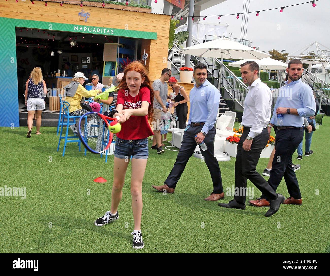 Sawyer Cowden 13, hits a ball at one of the fan booths at Hard Rock ...