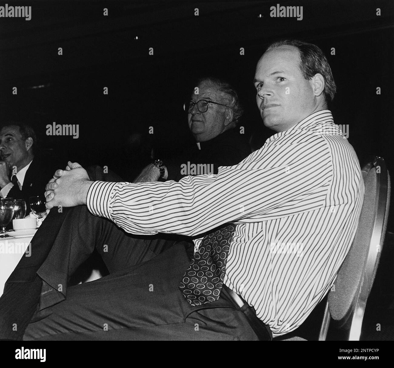 Representative Bob Michel's son, Robin, watching video of his father ...