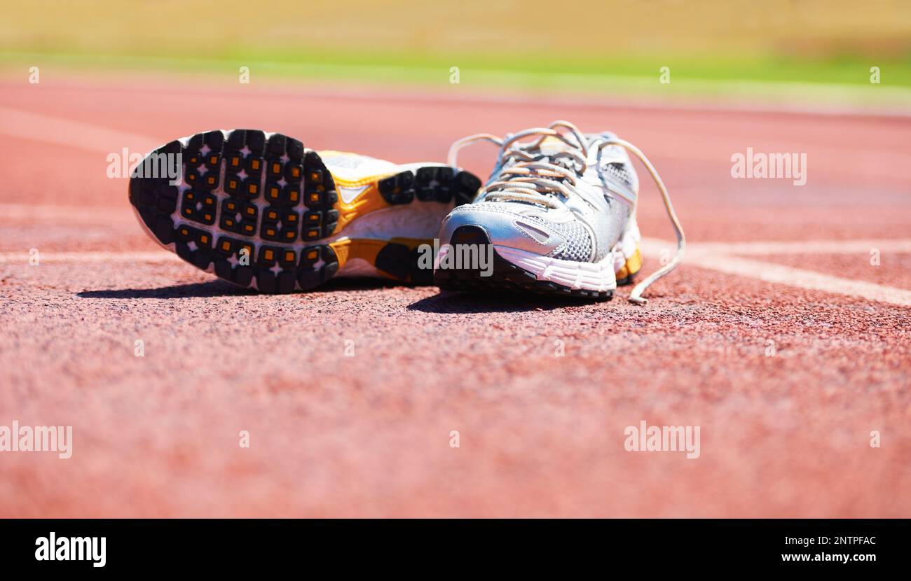 Taking a break from the race. A pair of running shoes lying on a ...