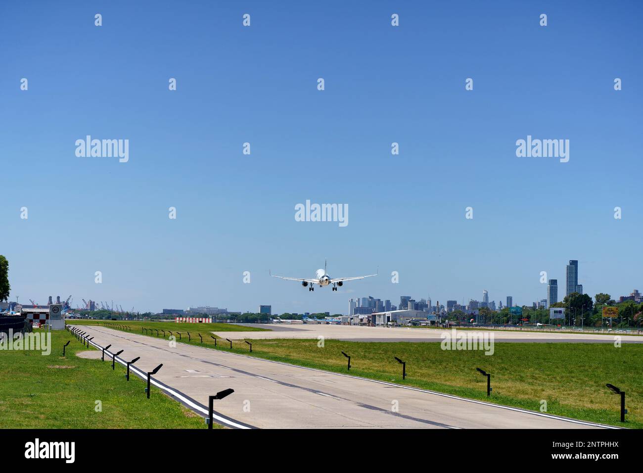 Airport runway with a plane taking off. Travel, transport, business ...
