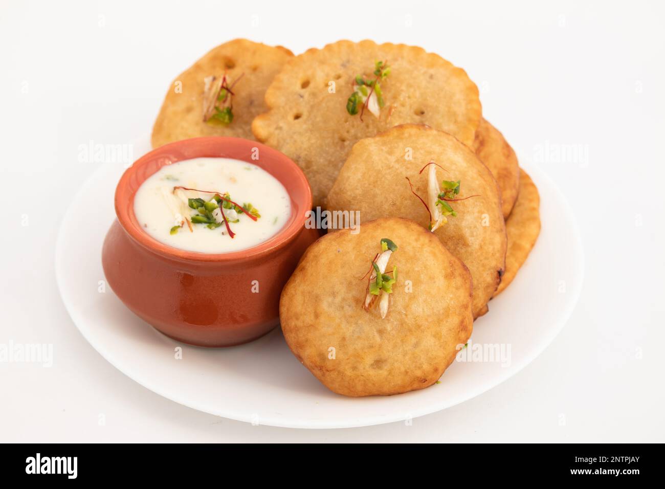 Traditional Indian Malpua, Pua Or Pooa Served With Lachhedar Malai ...
