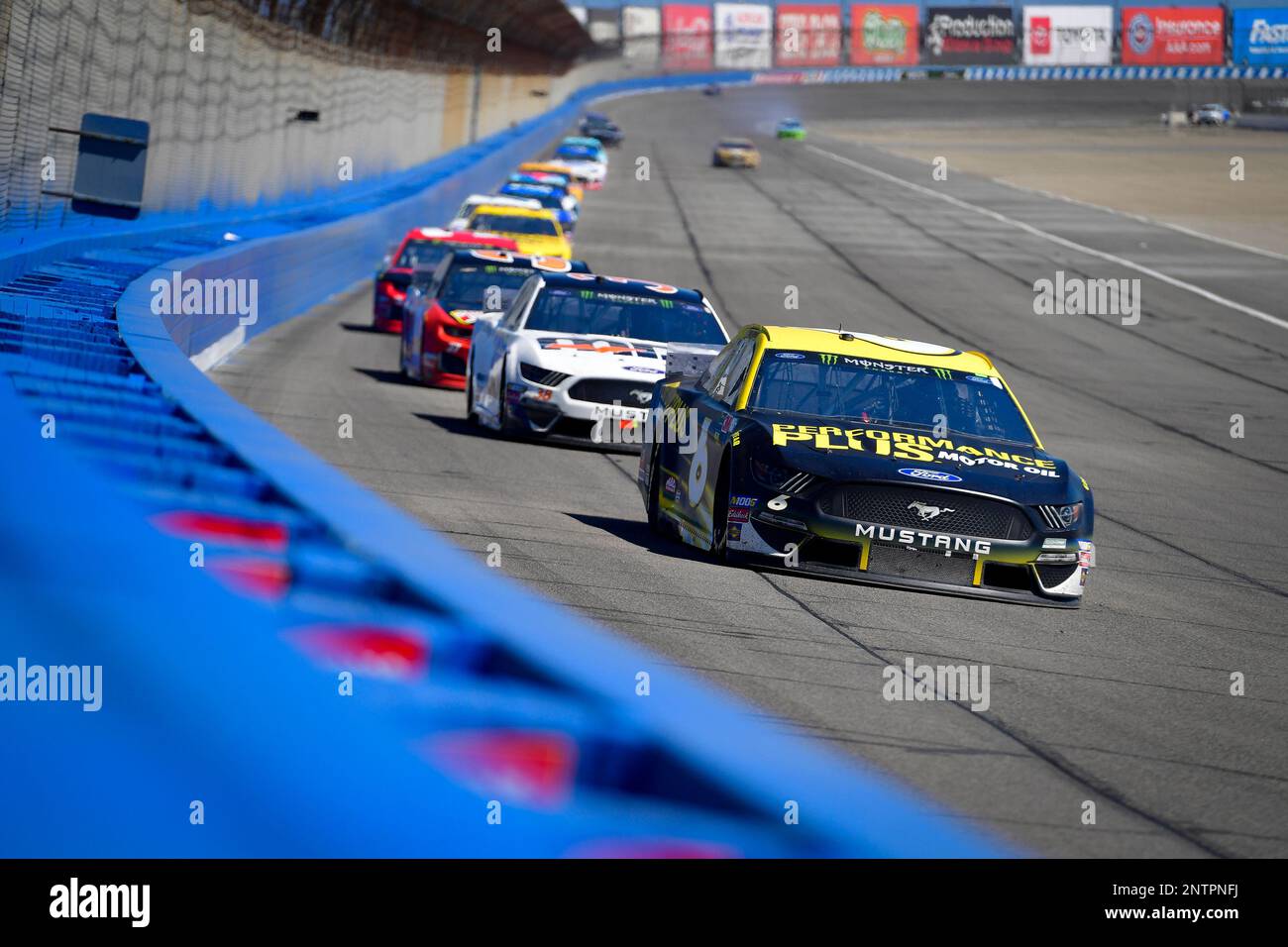 #6: Ryan Newman, Roush Fenway Racing, Ford Mustang leads #38: David ...