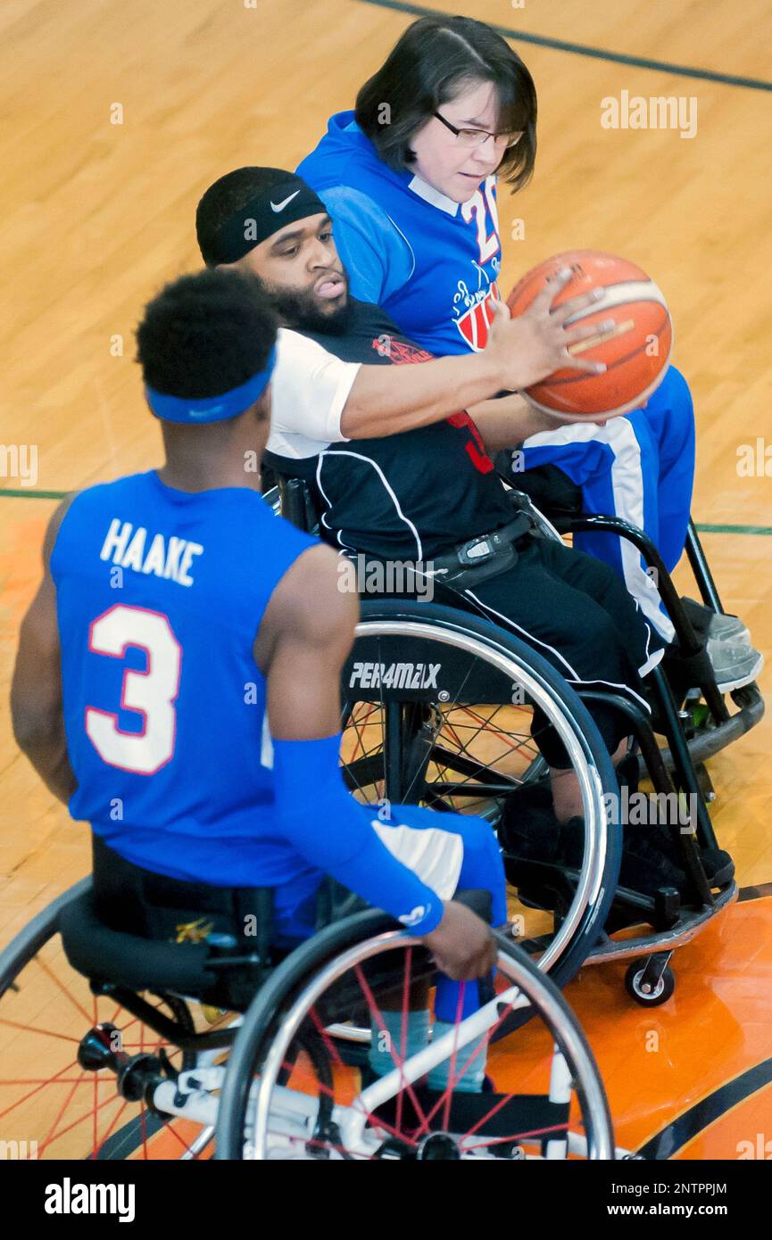 Spokes and Spires' BJ Bonmon (center) is double teamed by Cincinnati ...