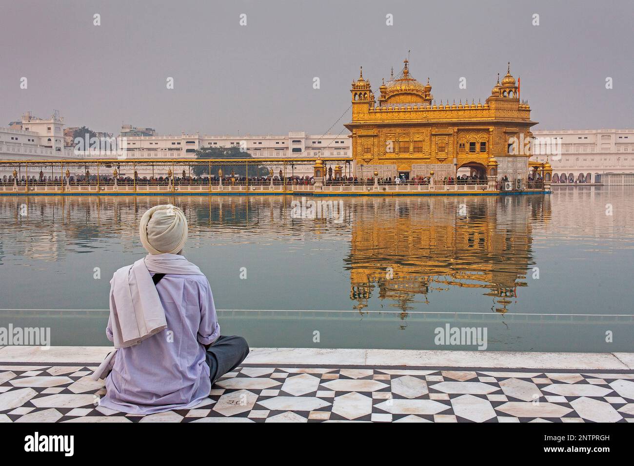 pilgrim and sacred pool Amrit Sarovar, Golden temple, Amritsar, Punjab ...