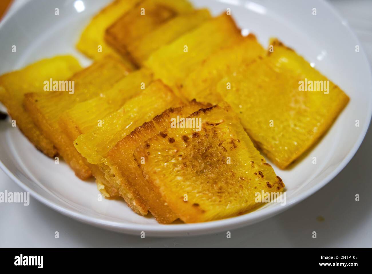 A plate of sweet and delicious Southeast Asian snacks, fried Indonesian ...