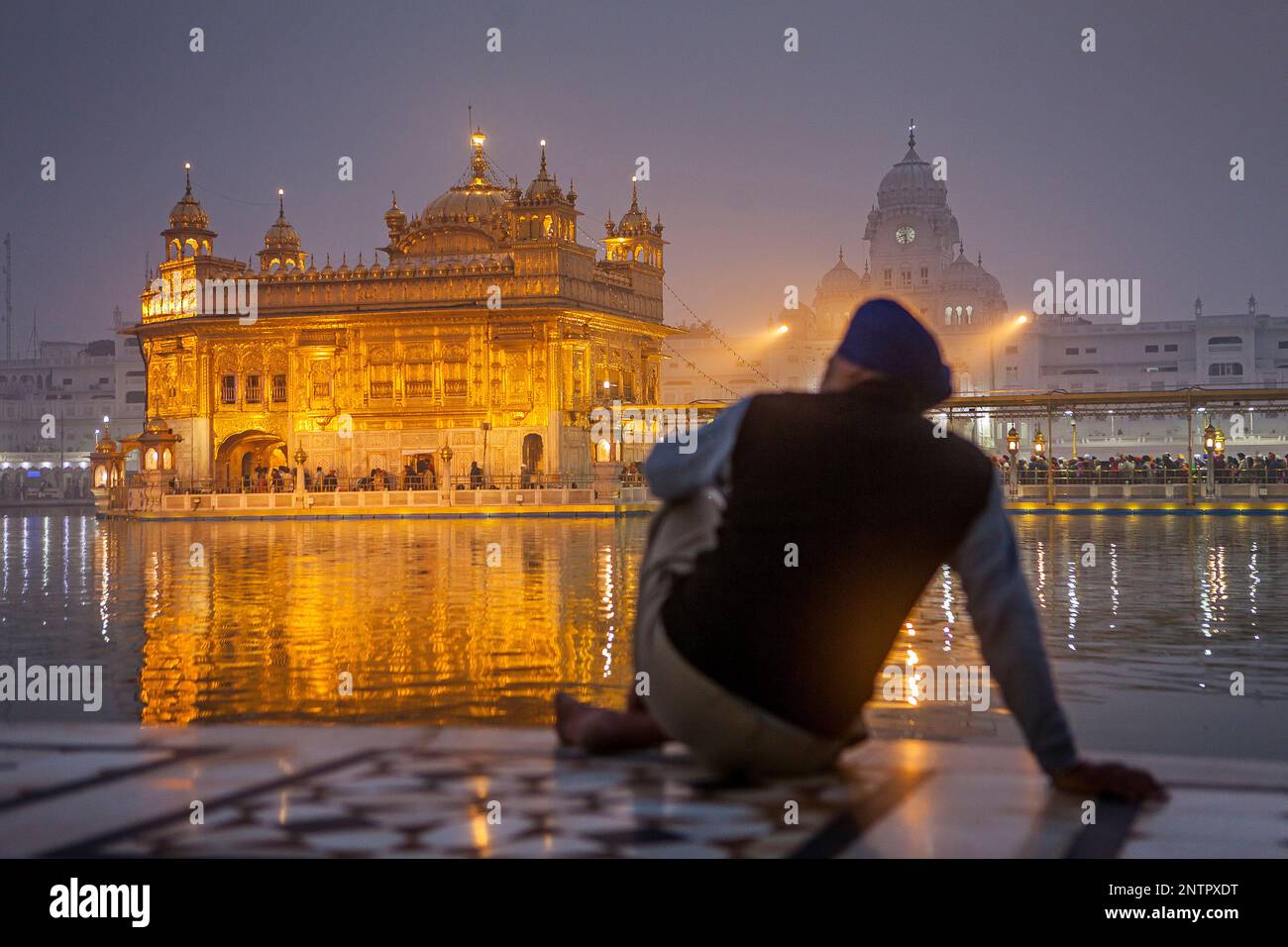 pilgrim and sacred pool Amrit Sarovar, Golden temple, Amritsar, Punjab ...