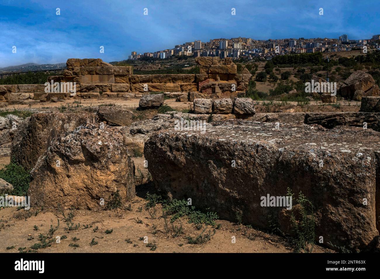 Ancient and modern: apartment blocks in the town of Agrigento in ...