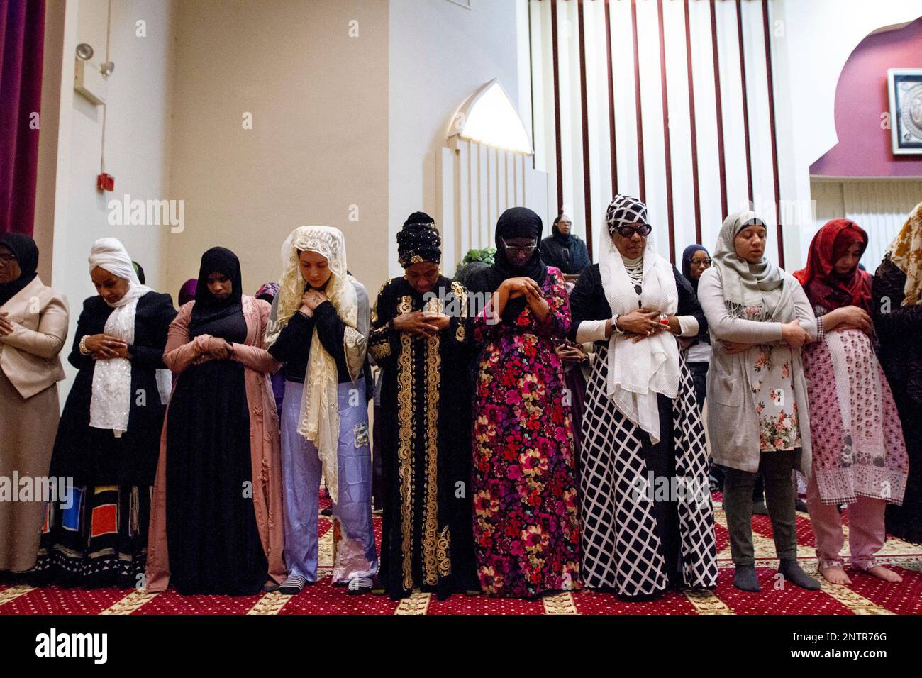 A group of women pray at the Masjidullah Mosque in Philadelphia, Friday ...