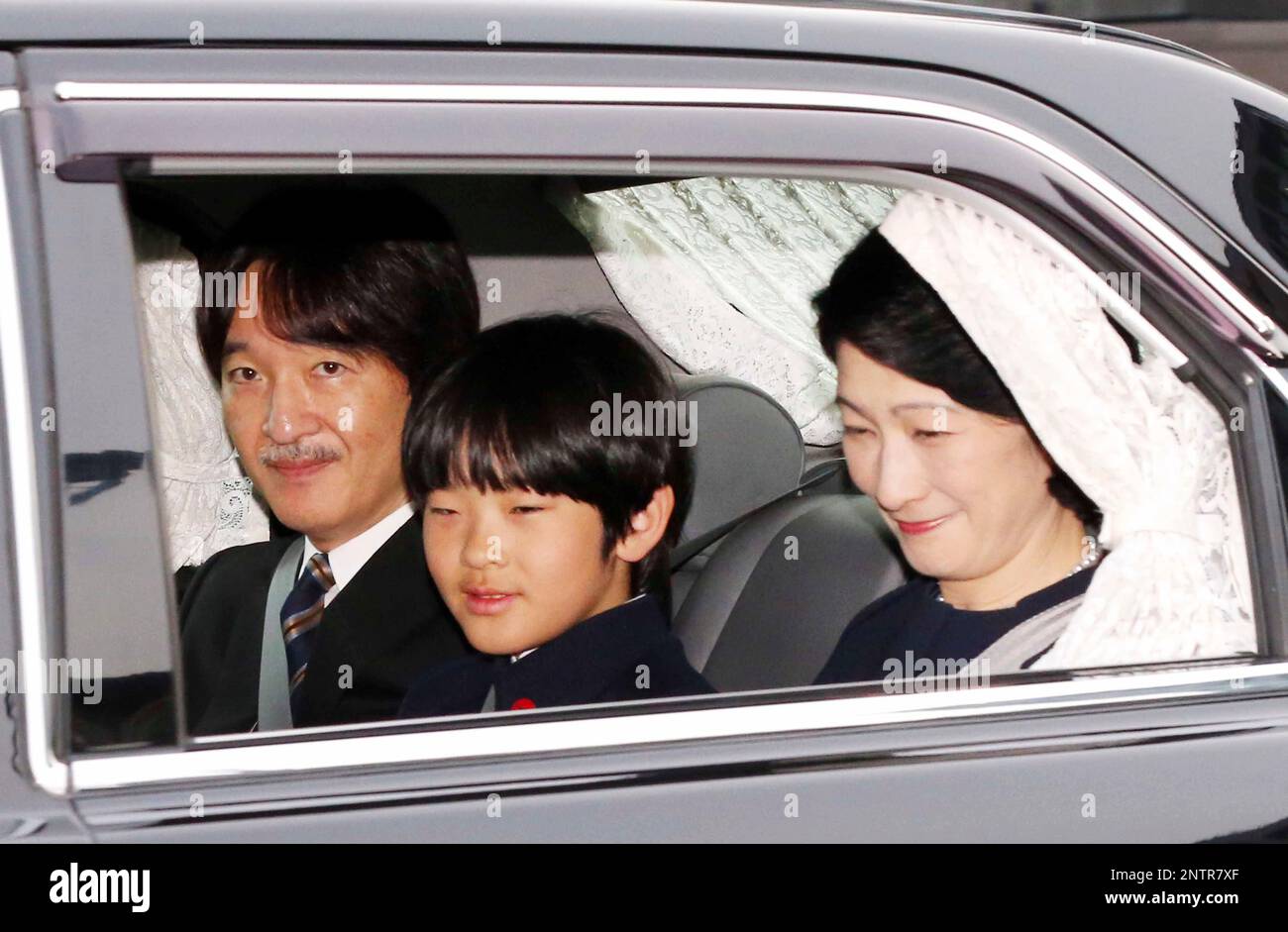 A vehicle carrying Prince Hisahito (C), the only son of Prince Akishino ...
