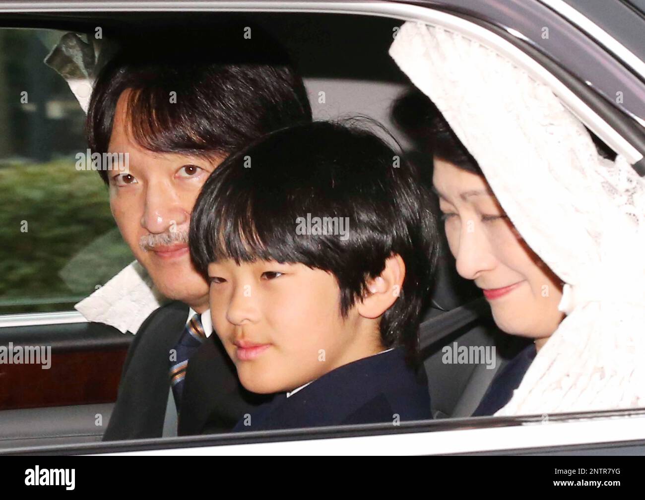A vehicle carrying Prince Hisahito (C), the only son of Prince Akishino ...