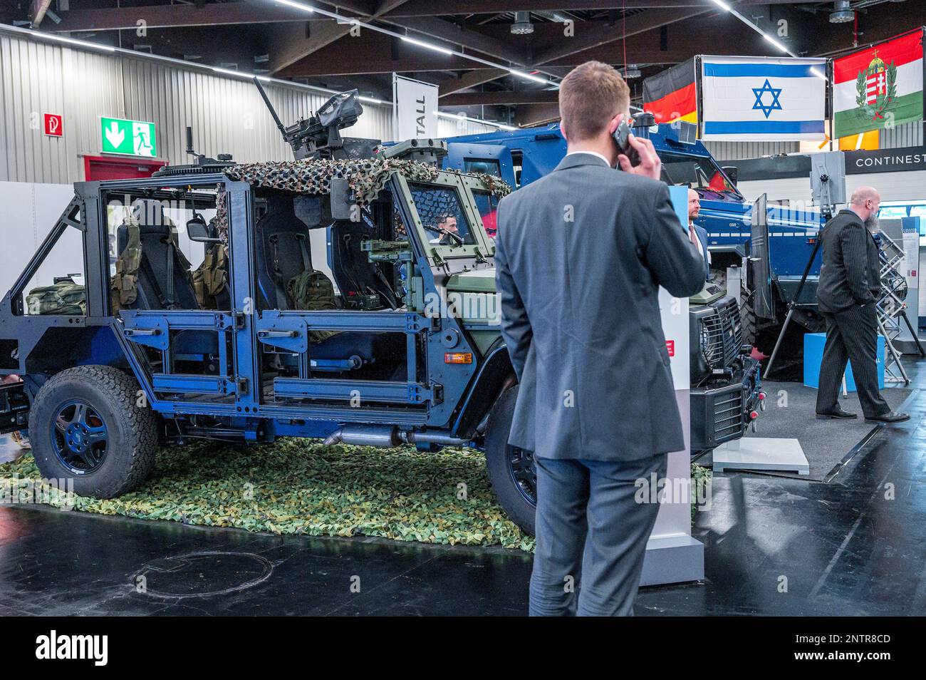Nuremberg, Germany. 28th Feb, 2023. Military vehicles are on display at the Rheinmetall stand ...