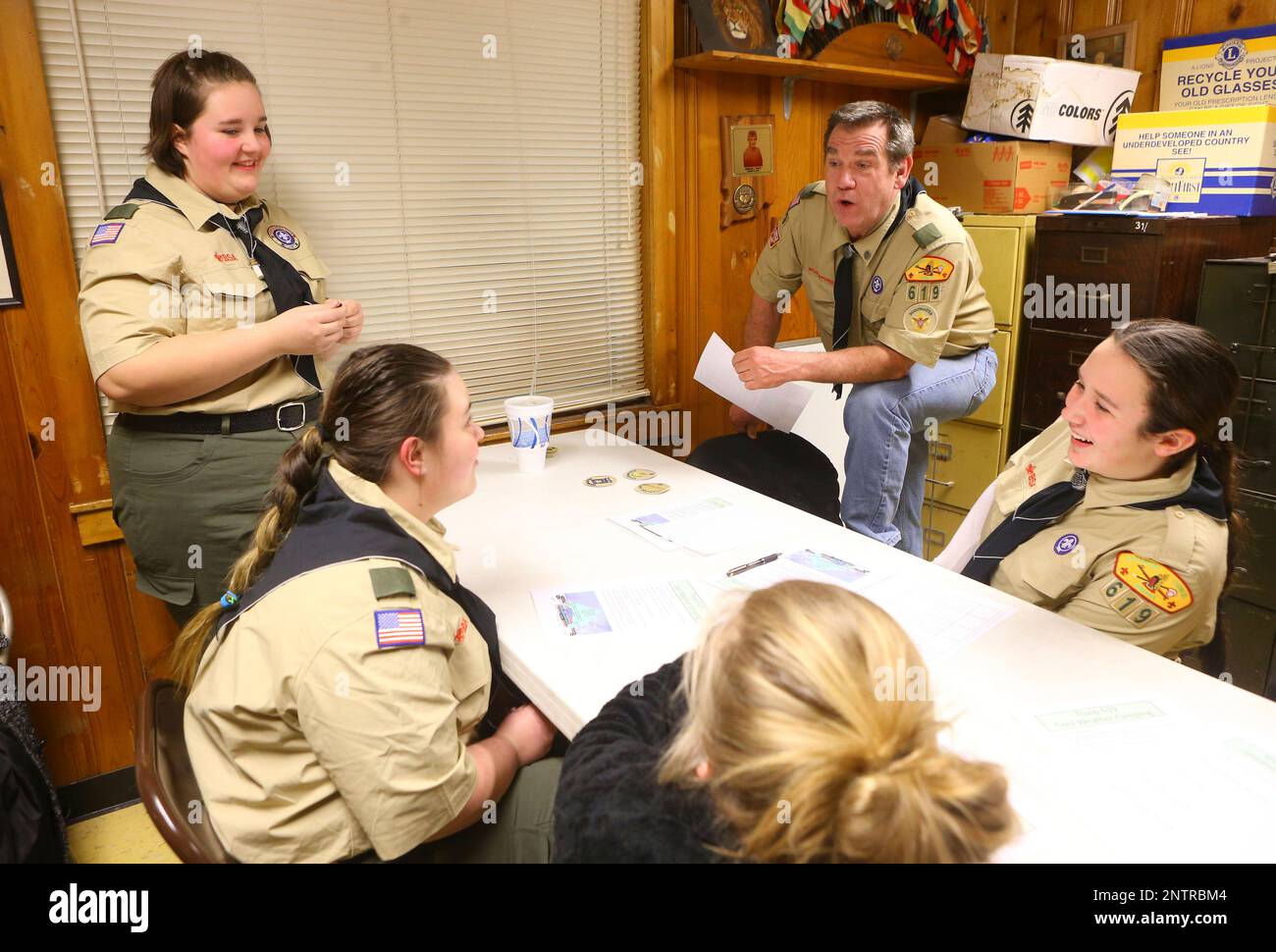 In this March 5, 2019, photo scoutmaster Dennis Dunten talks with ...