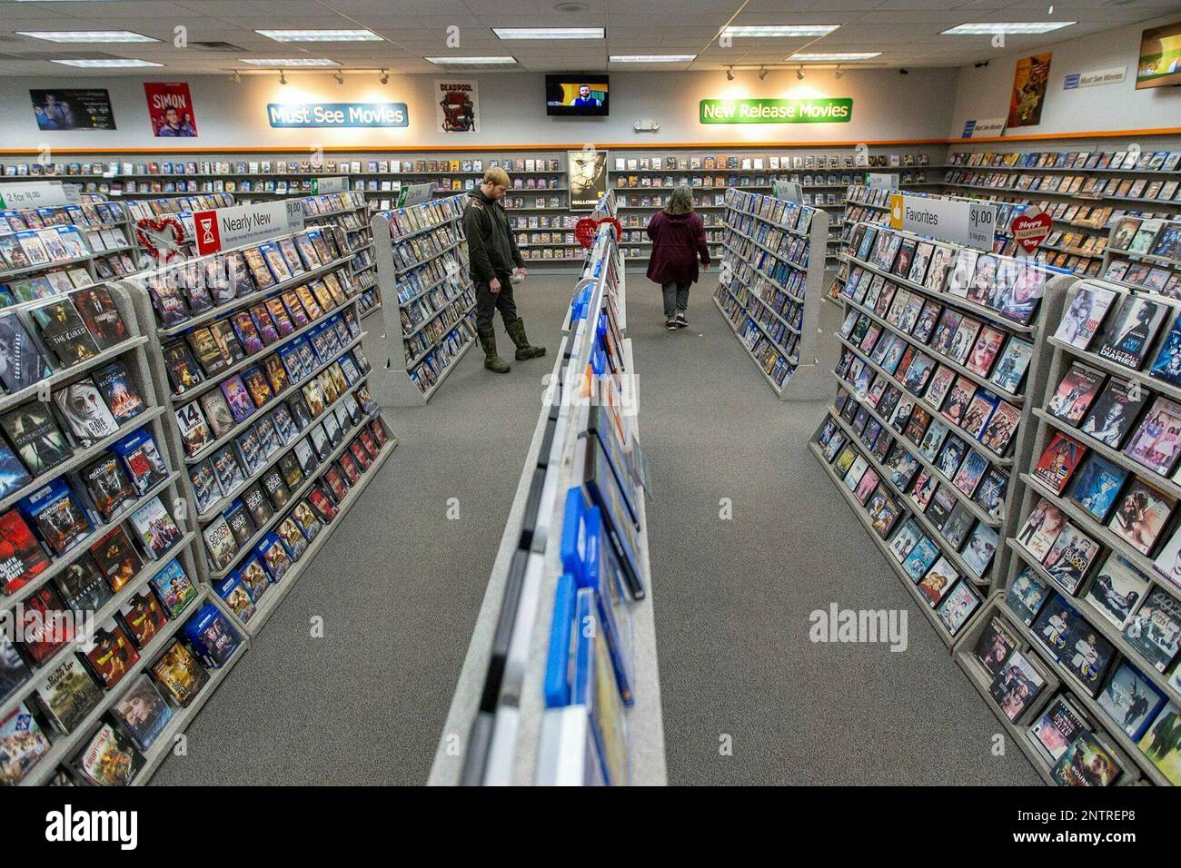 Shoppers look for videos at Family Video in Warren, Pa. The store was ...