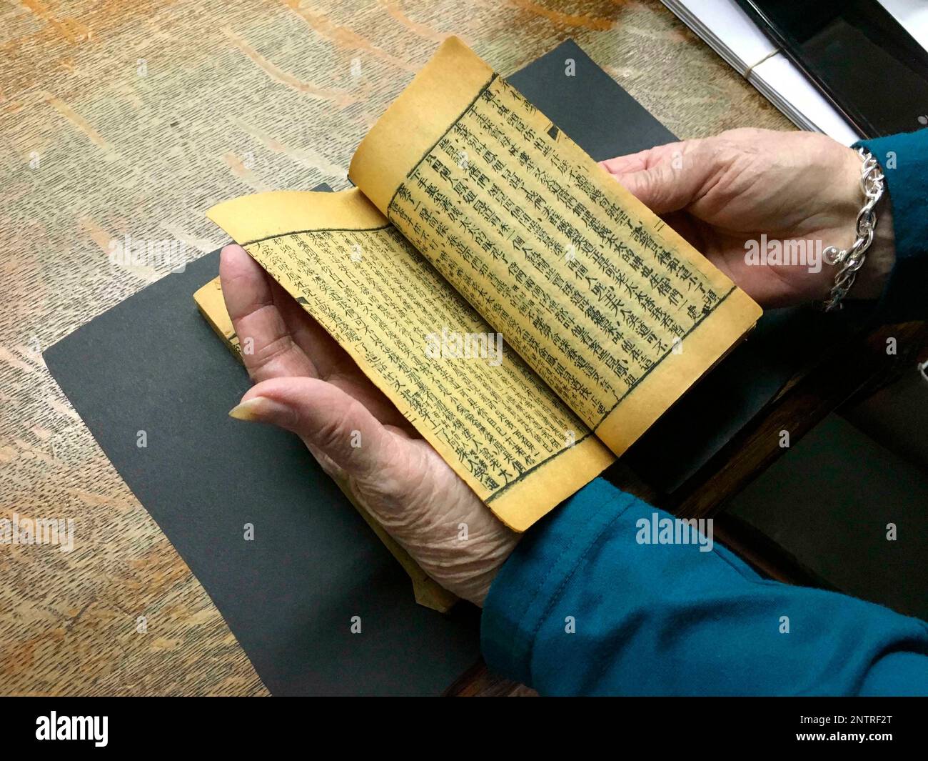 Betty Anderson, director of the Beaver Falls Historical Museum, holds a ...
