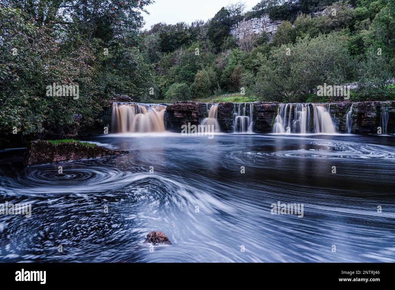 Waterfalls in the Yorkshire Dales countryside. Long exposure to produce ...