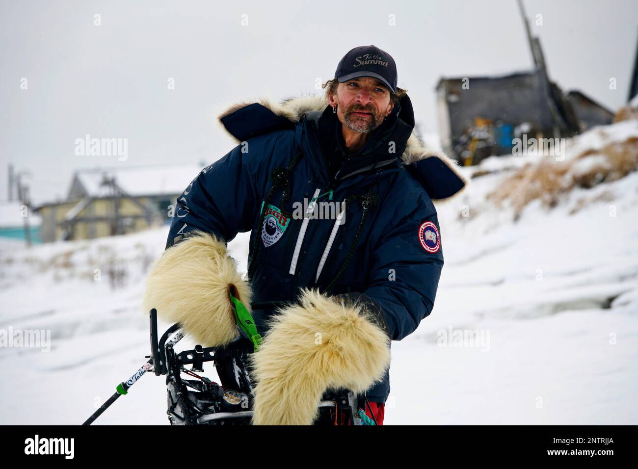 In this Monday, March 11, 2019 photo, musher Lance Mackey arrives in ...