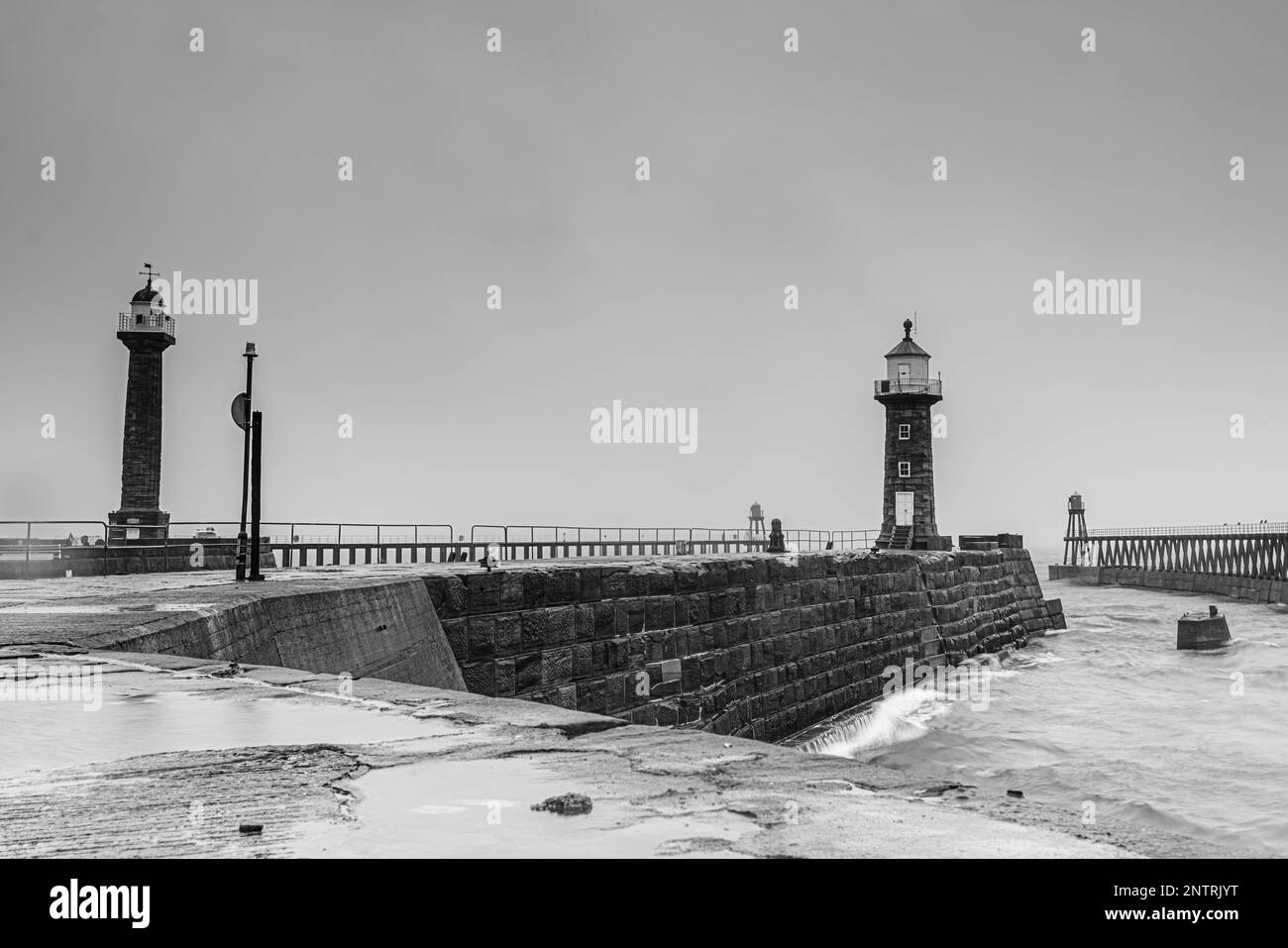 Whitby harbour piers and lighthouses to warn the boats and ships coming ...