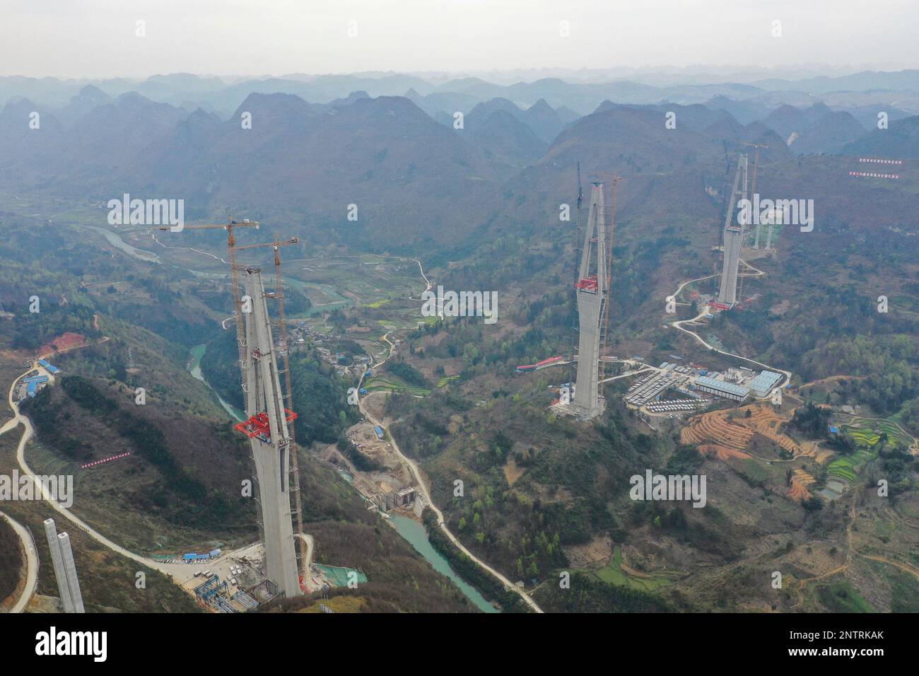 A view of the pylons of a cable-stayed bridge under construction in ...