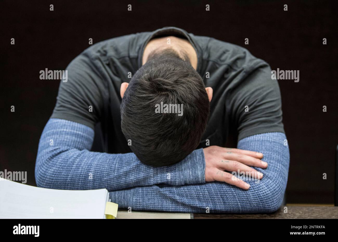 CORRECTS THE DEFENDANT'S AGE -- 22 years old Ali Bashar covers his face ...