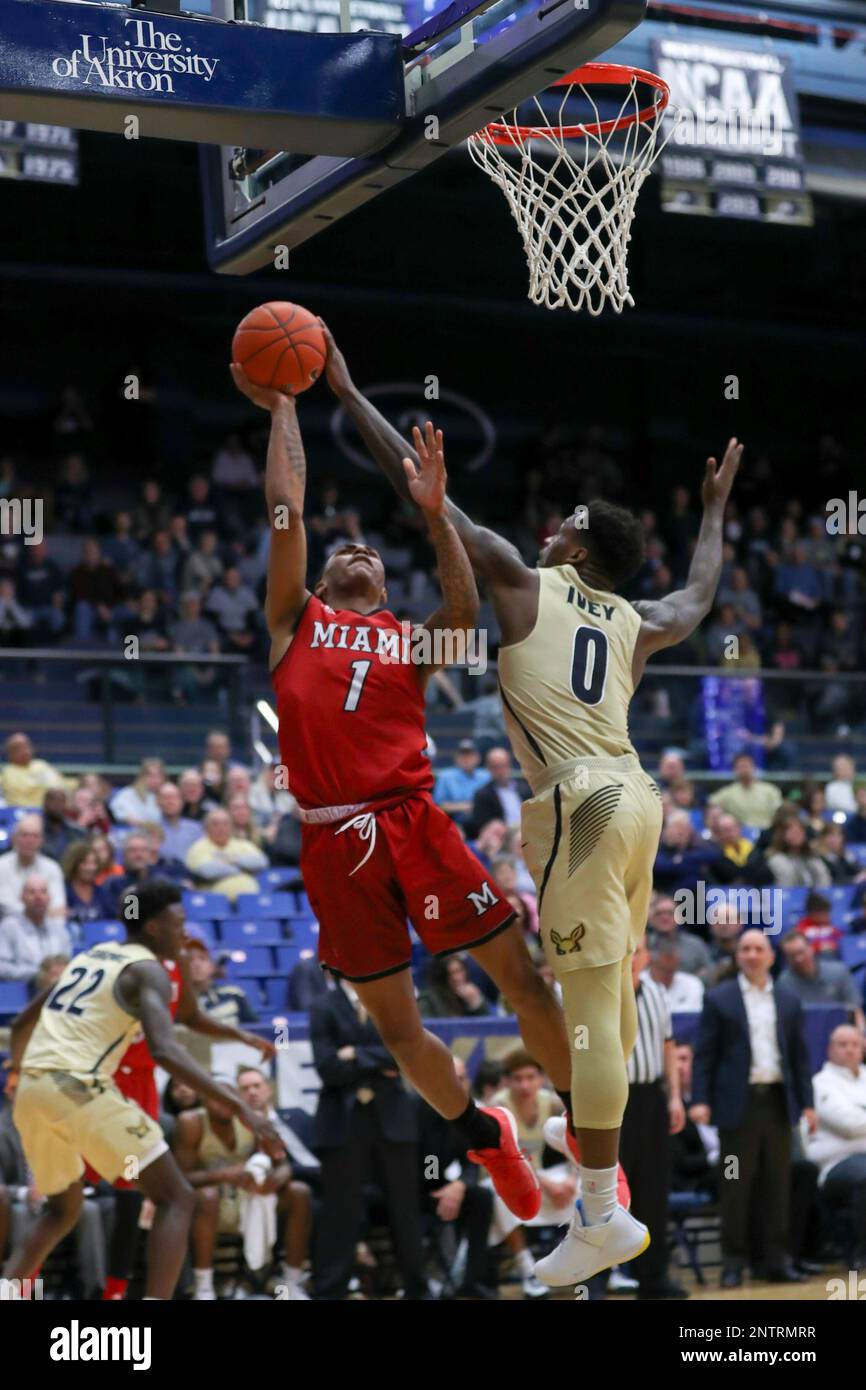 AKRON, OH - MARCH 11: Akron Zips guard Jimond Ivey (0) blocks the shot ...