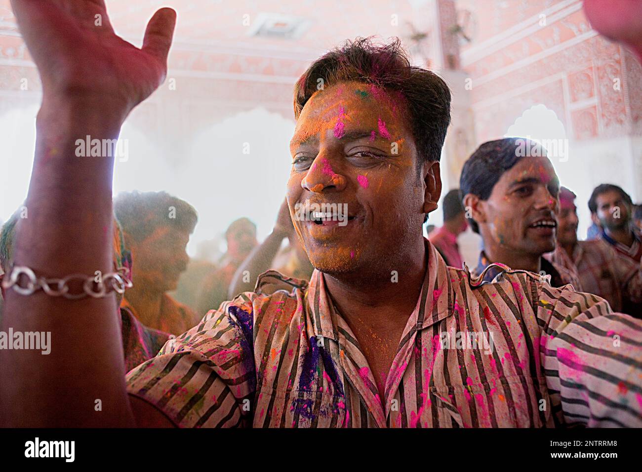 Man celebrating the Holi spring festival to celebrate the love between ...