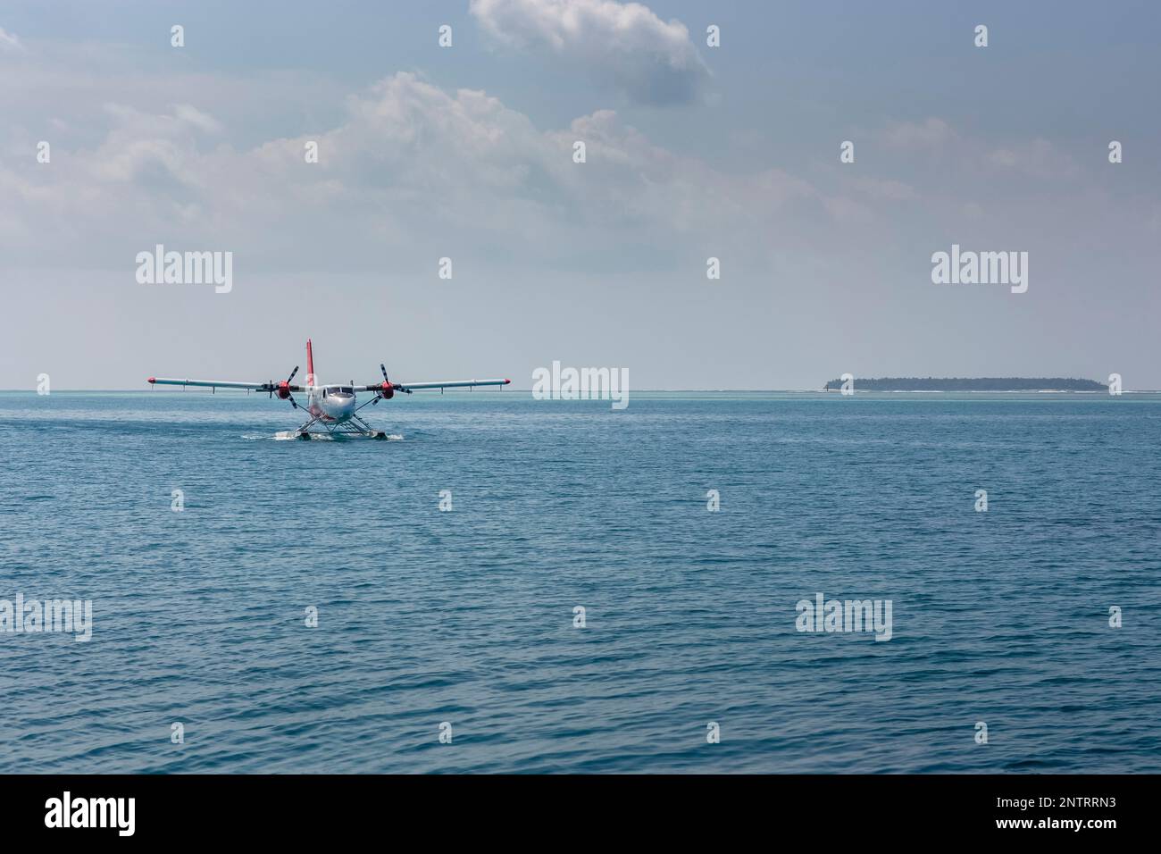 The seaplane landed in the Maldives at sea. Seascape in the tropics ...