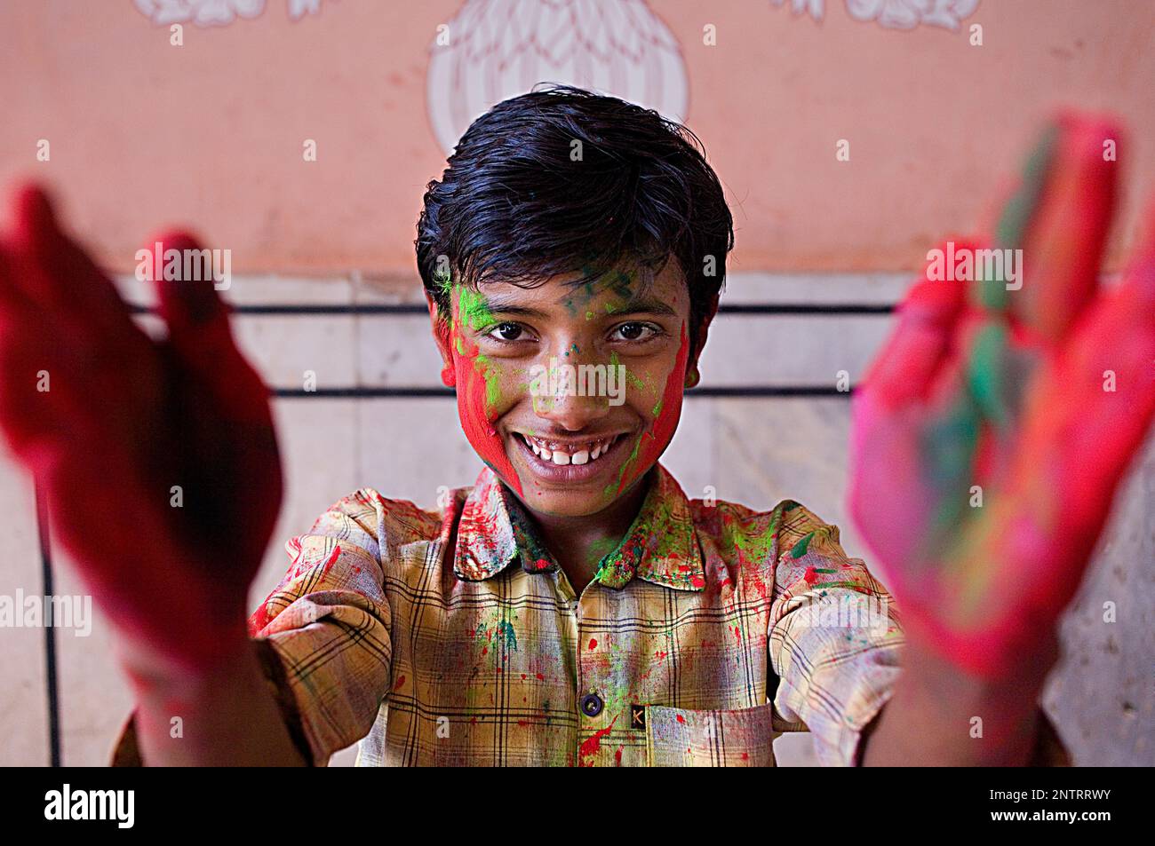 Child celebrating the Holi spring festival to celebrate the love ...